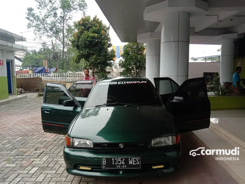 Jual Mobil Mazda 323 1995 Interplay MT 1.6 di Banten Manual Sedan Hijau ...